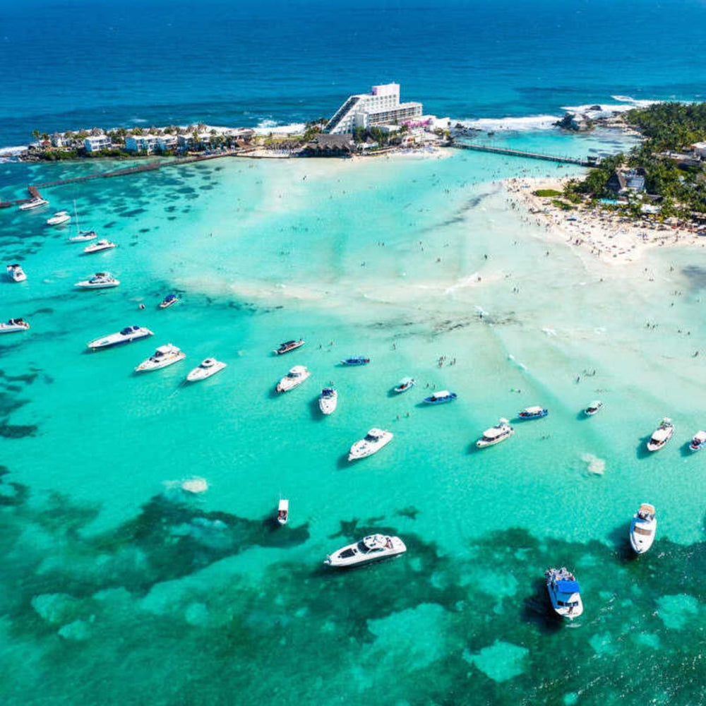 Yacht Charter to Isla Mujeres | Snorkeling, Open Bar & Gourmet Dining